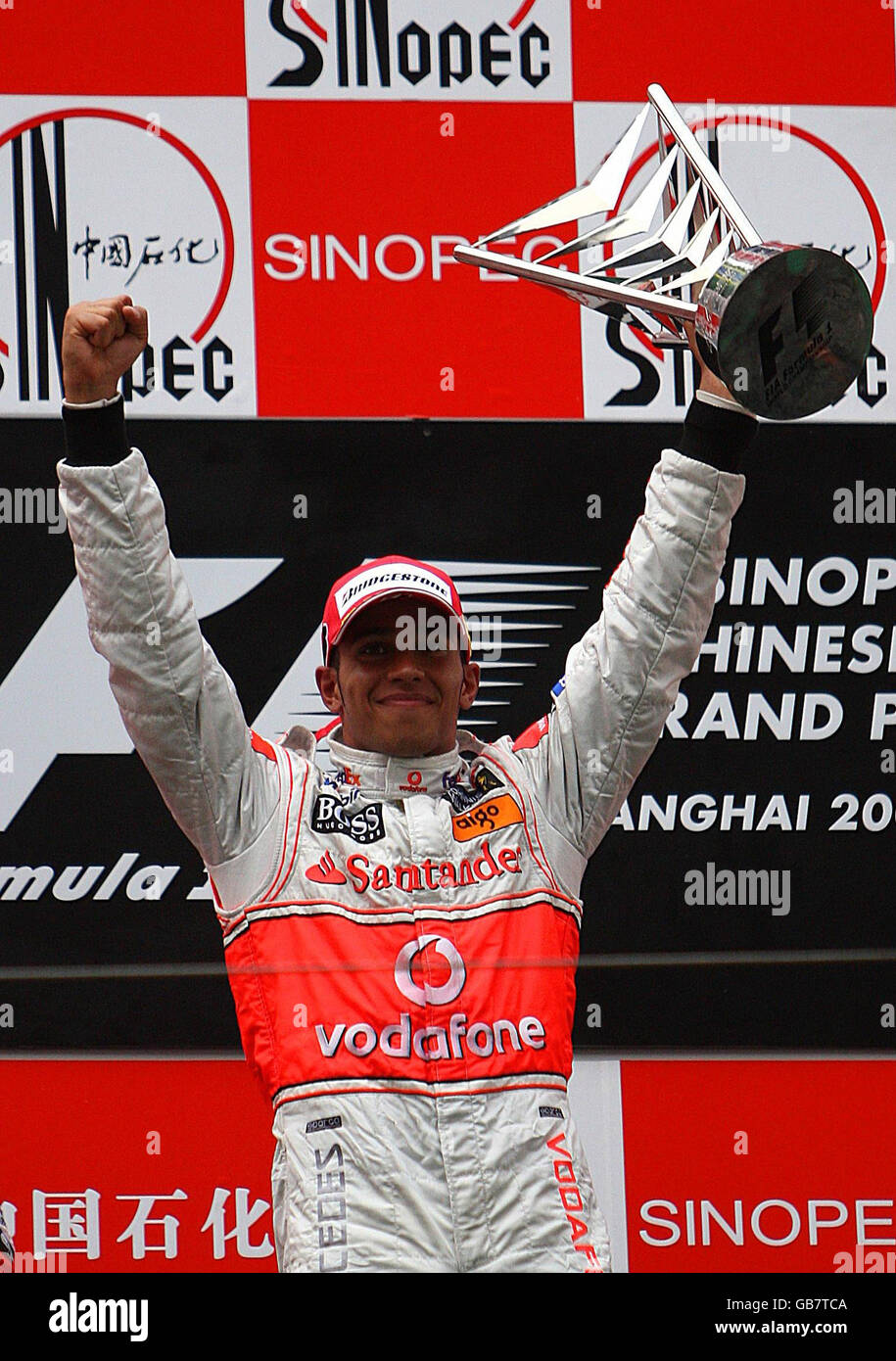 McLaren Mercedes' Lewis Hamilton celebrates his victory following the ...