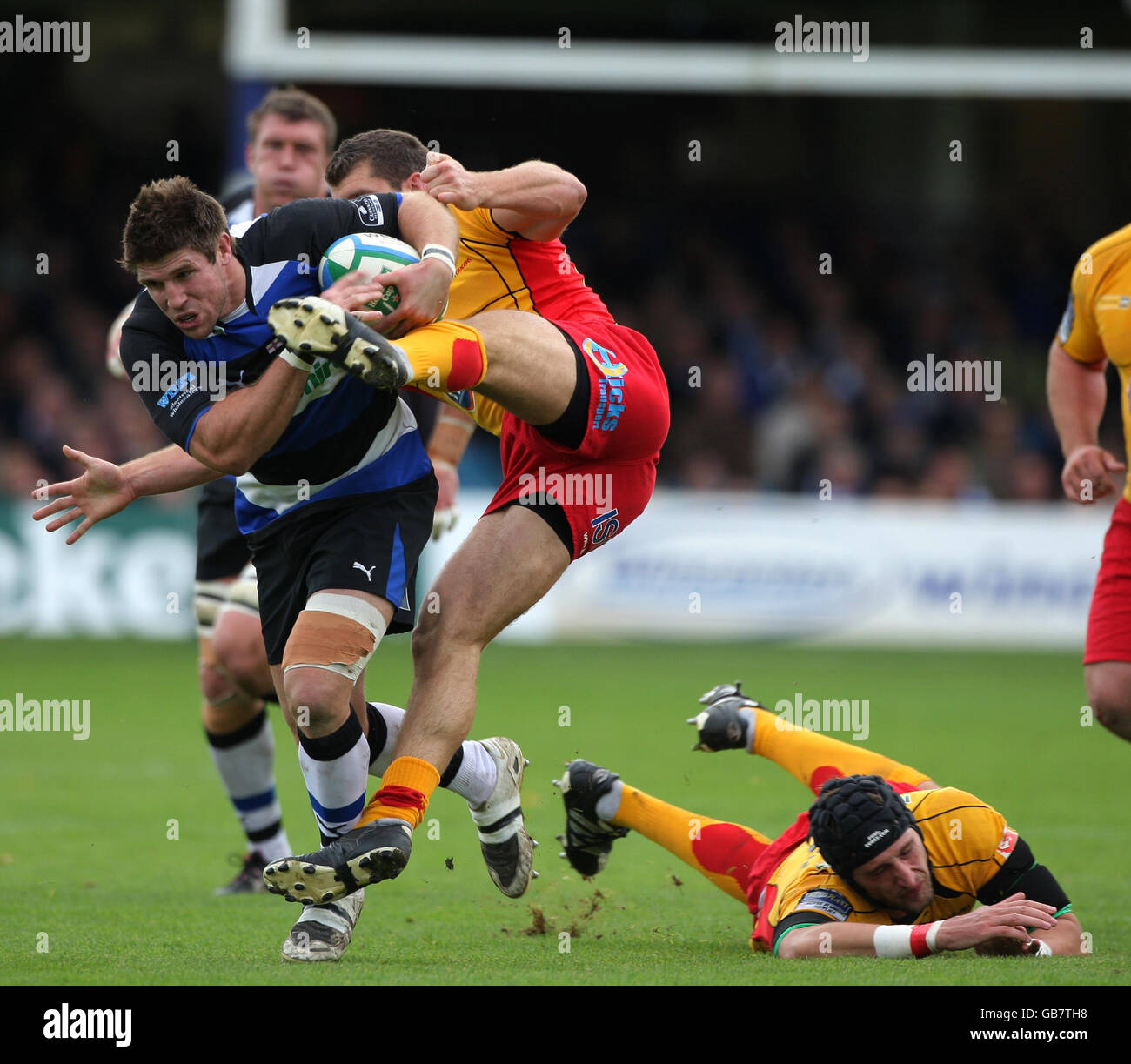 Rugby full length player players ball tackle tackles action hi-res ...