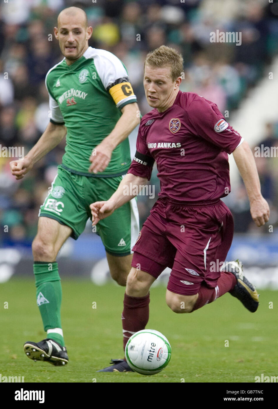Hearts' Andrew Driver breaks away from Hibernian's Rob Jones during the ...