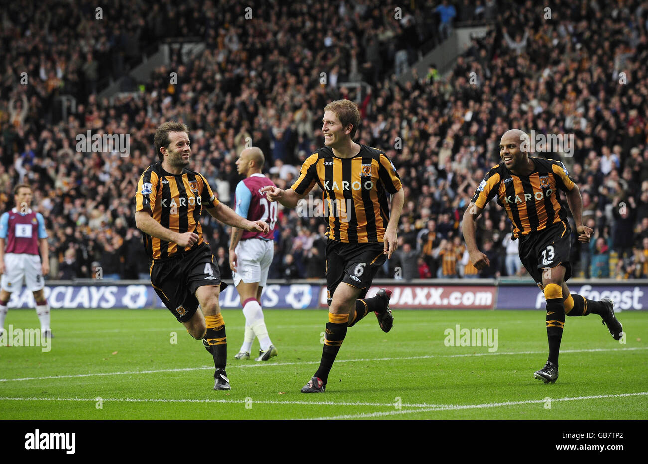 Michael Turner (centre) celebrates his goal for Hull City with Ian ...