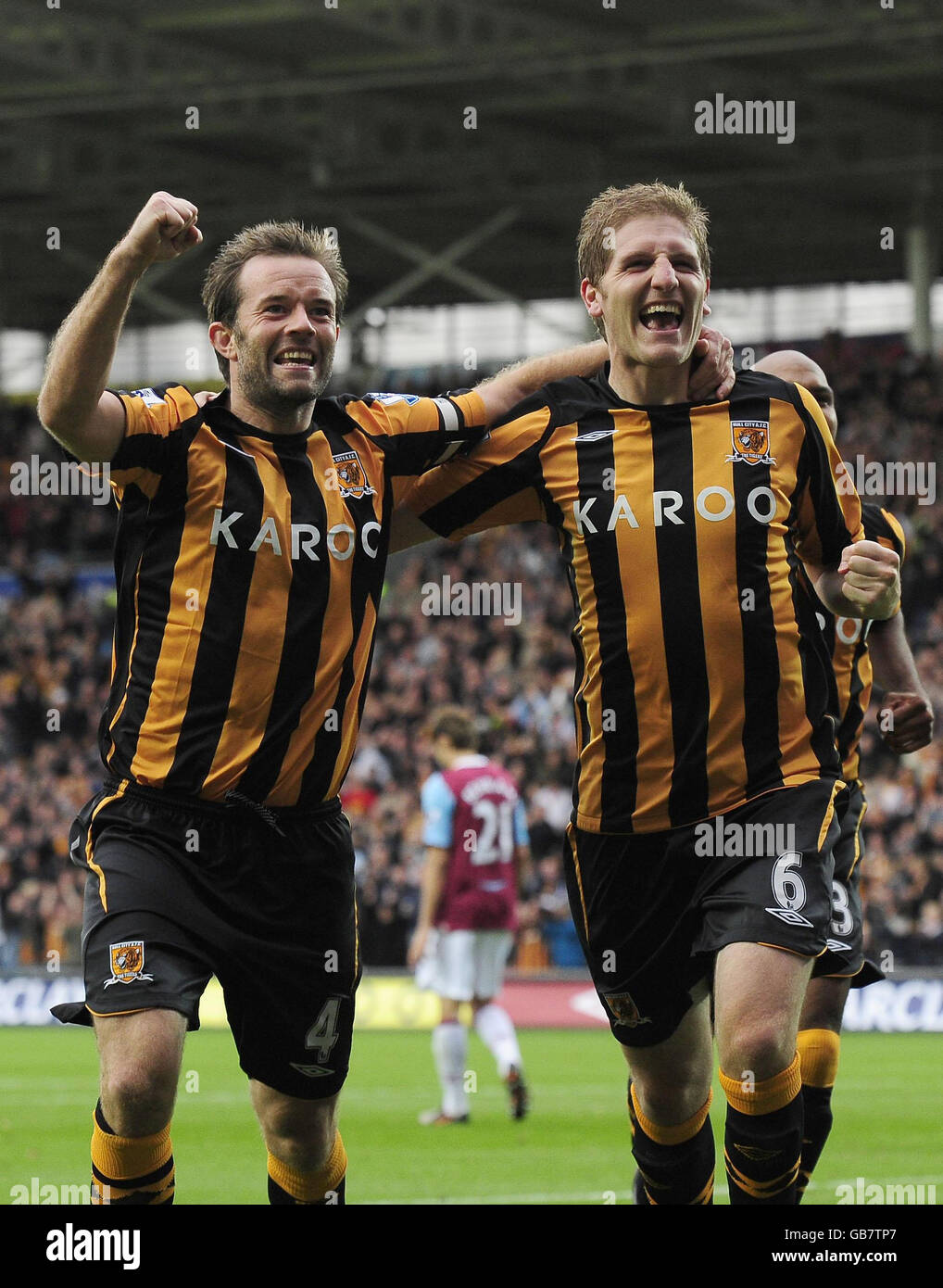 Michael Turner (centre) celebrates his goal for Hull City with Ian ...