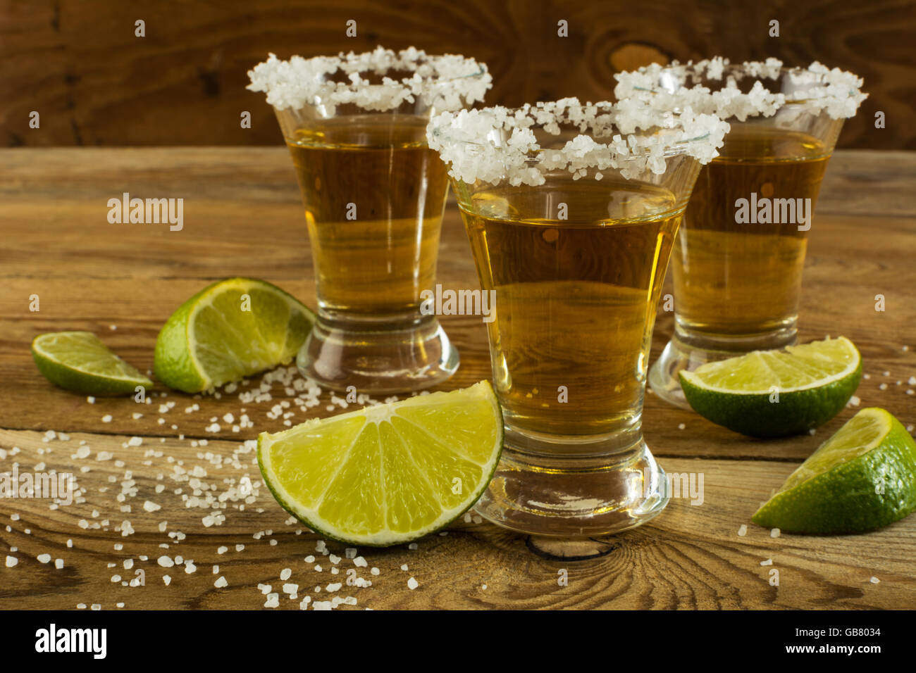 Gold Mexican tequila with lime and salt, close up. Tequila. Tequila ...