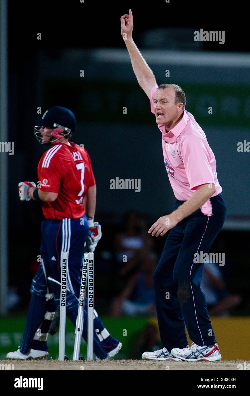 Middlesex's Shaun Udal celebrates running out England's Ian Bell during ...