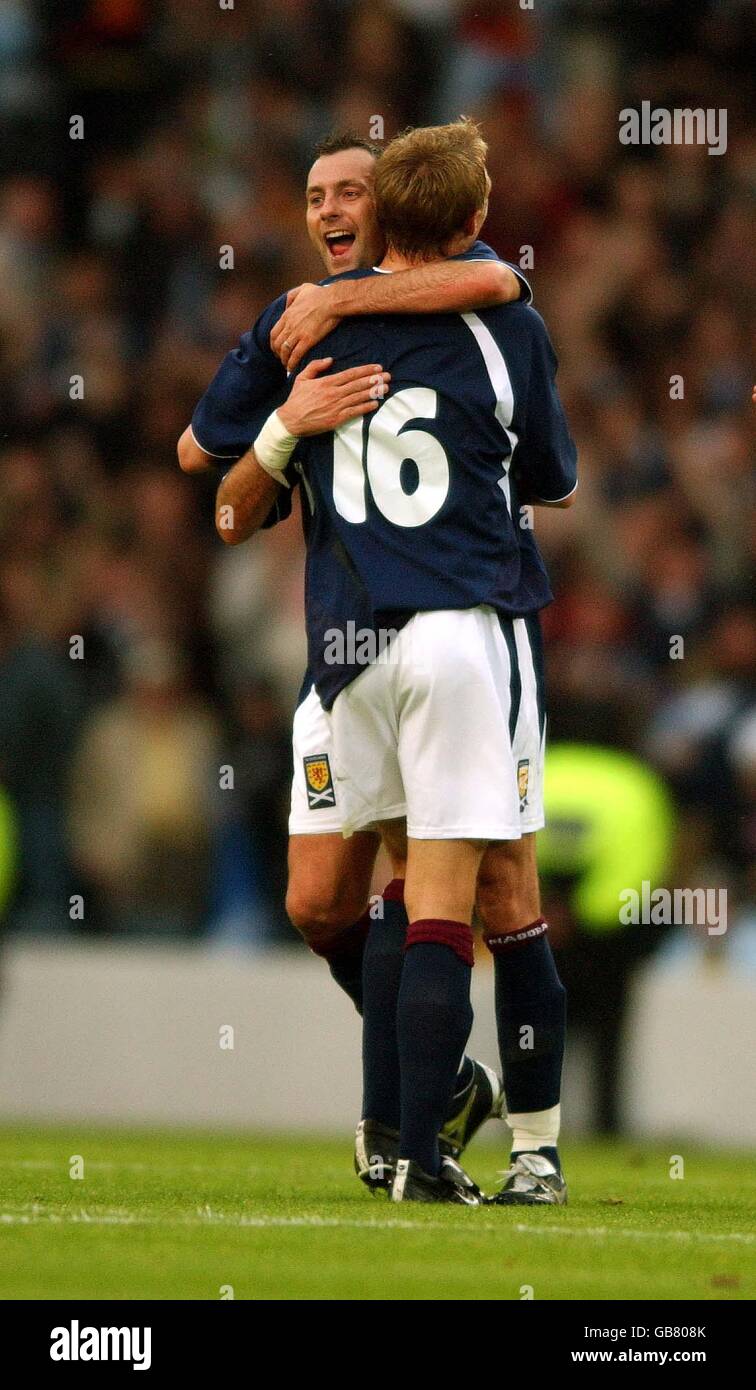 Scotland's Don Hutchison celebrates with winning goalscorer Darren ...