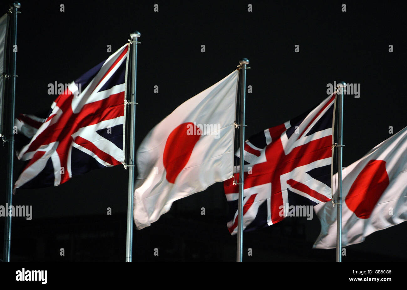The national flags of Great Britain and Japan are flown as The Prince ...
