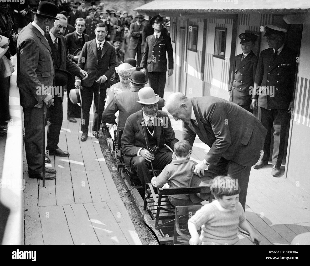 King George V and Queen Mary, in a rear car, ready to start a journey ...