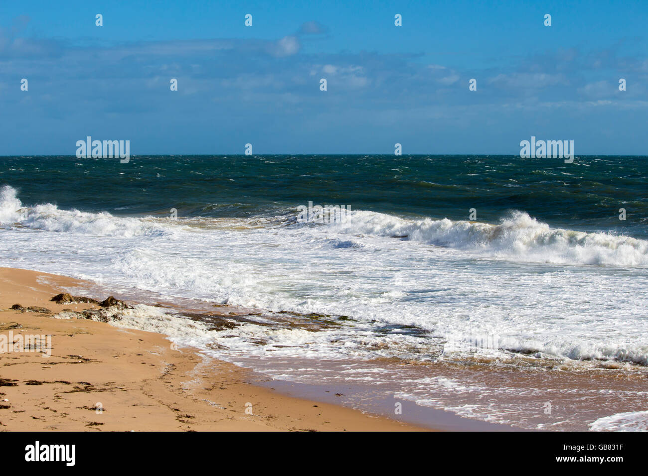 Indian ocean breaking dark basalt rocks hi-res stock photography and ...