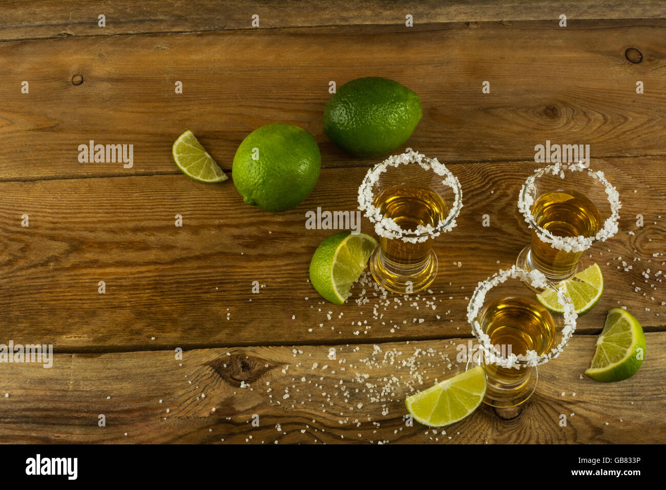 Gold Mexican tequila with lime and salt. Tequila. Tequila shot Stock ...