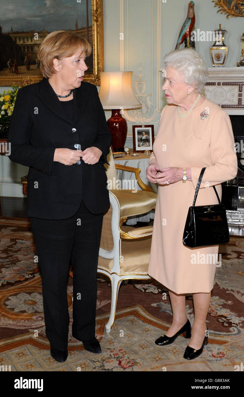 Britain's Queen Elizabeth II receives German Chancellor Angela Merkel ...