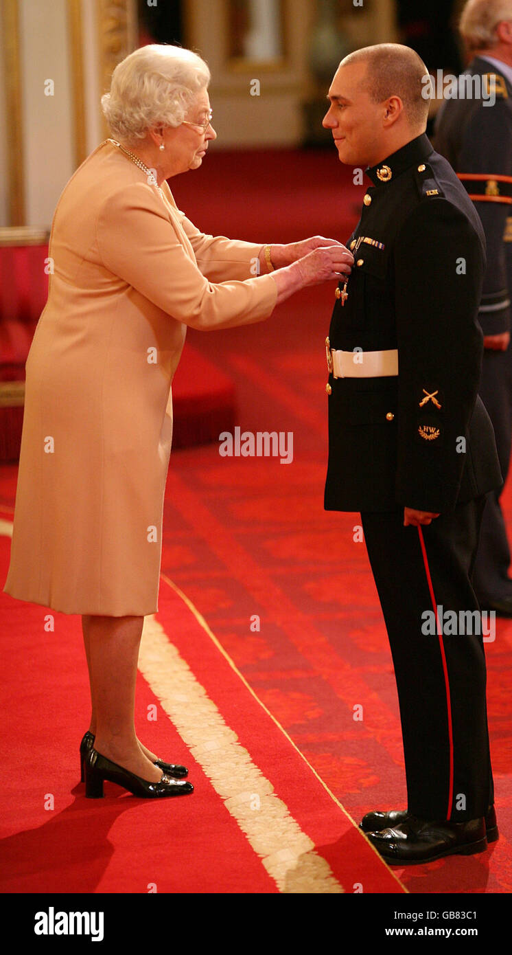 Lance Corporal Matthew Croucher of 40 Commando receives the George ...