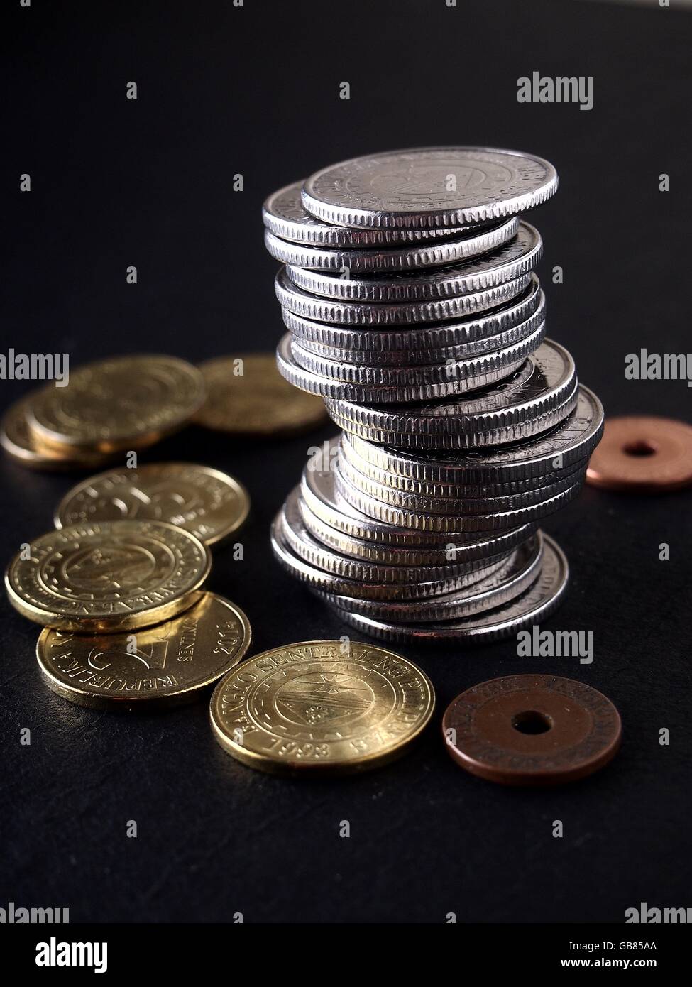 Stack of silver and gold coins Stock Photo - Alamy