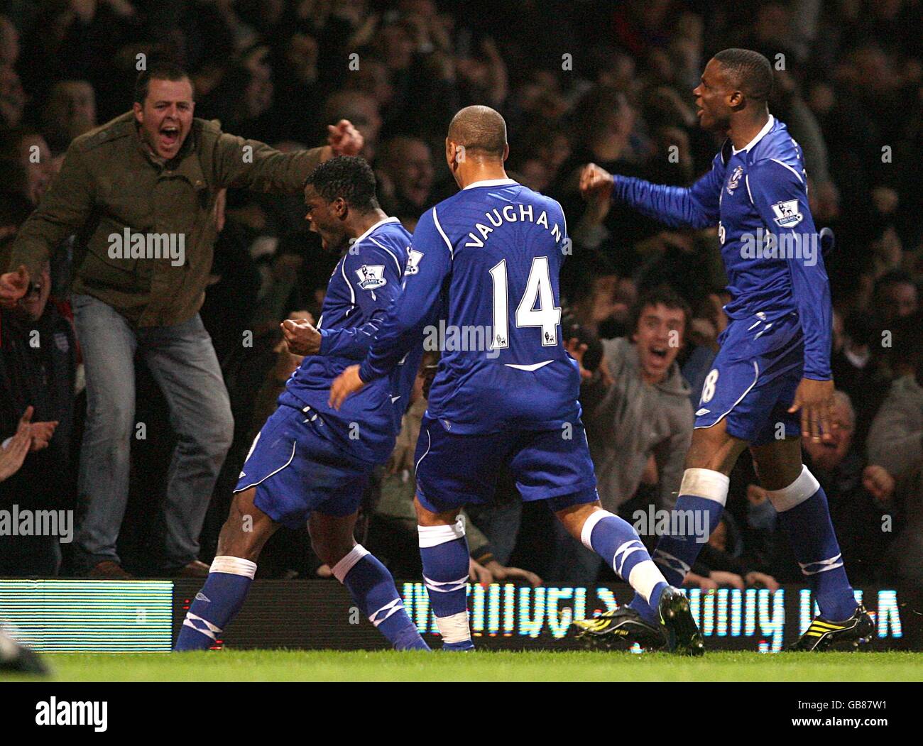 Everton's Louis Saha (l) celebrates scoring his sides second goal Stock ...