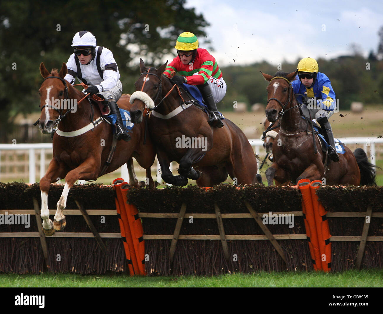 Jockey Finbar Keniry on Halton Castle (l) jumps ahead of jockey Kenneth ...