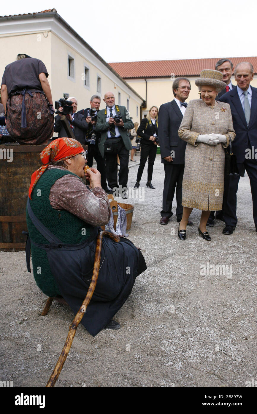 Britain's Queen Elizabeth II and The Duke of Edinburgh (right) meet ...