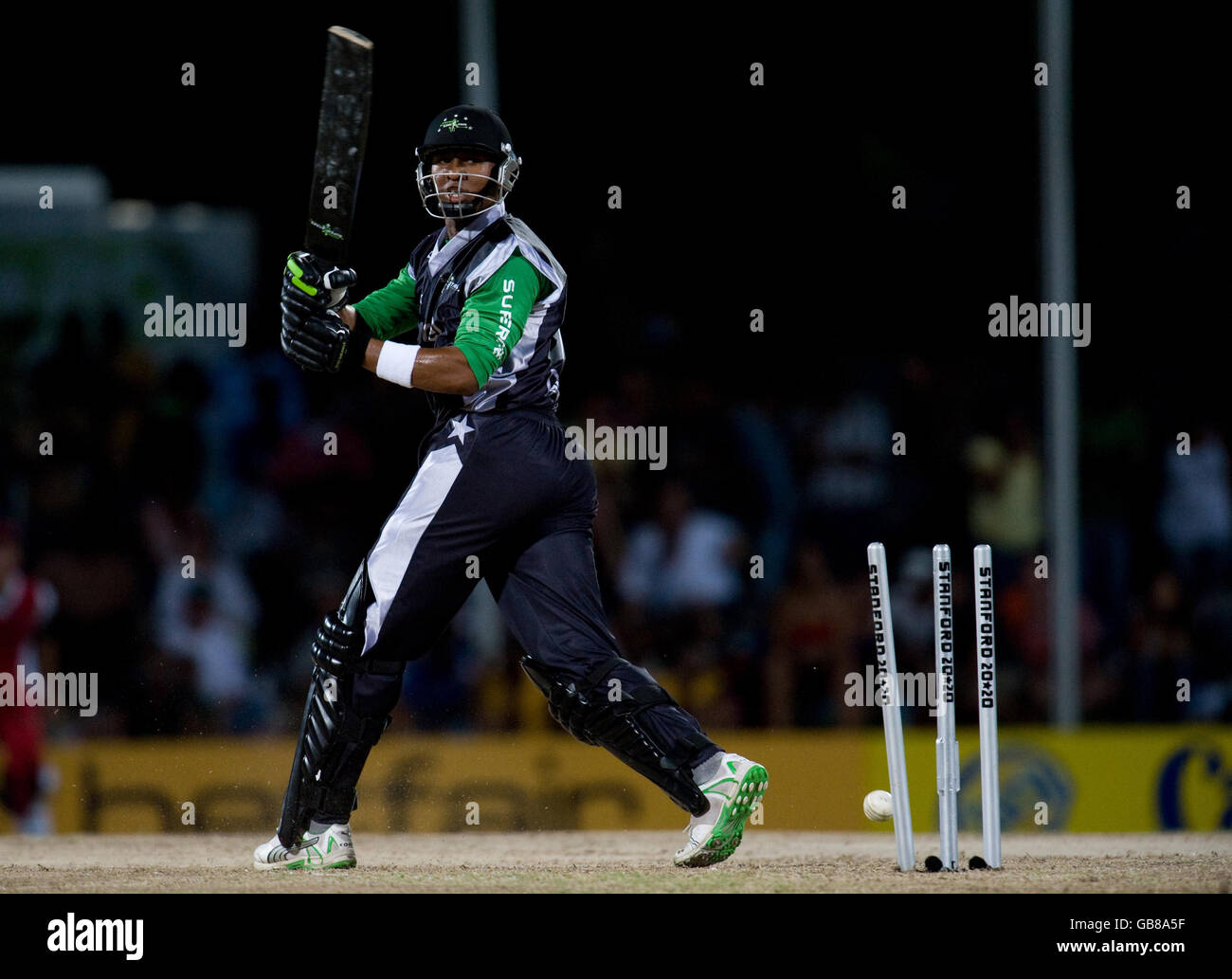 Stanford Superstars' Lyndon James is bowled by Trinidad and Tobago's ...