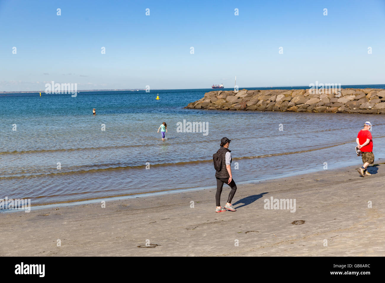 People walk at beach hi-res stock photography and images - Alamy