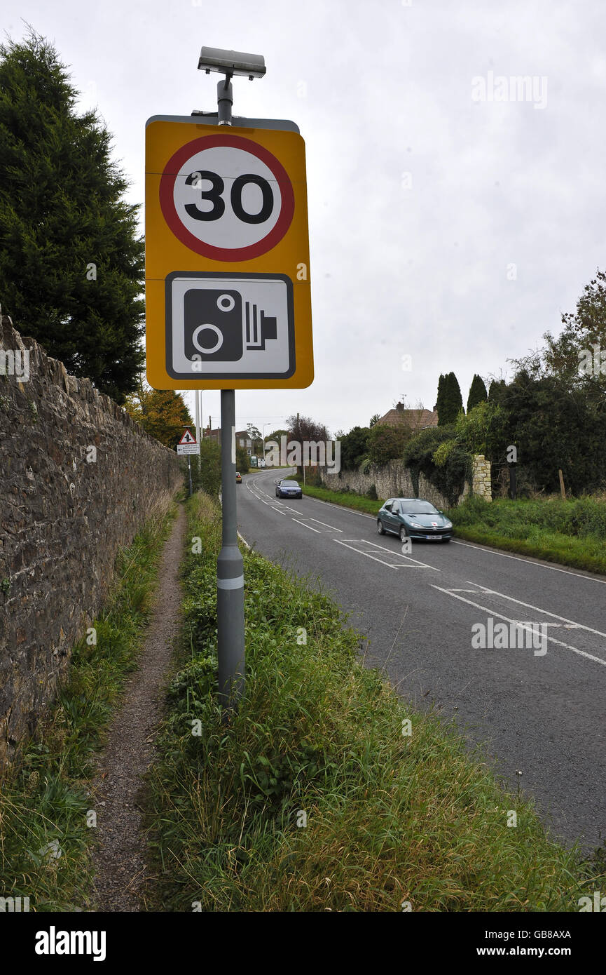 A 30mph sign with speed cameras symbol underneath hi-res stock ...