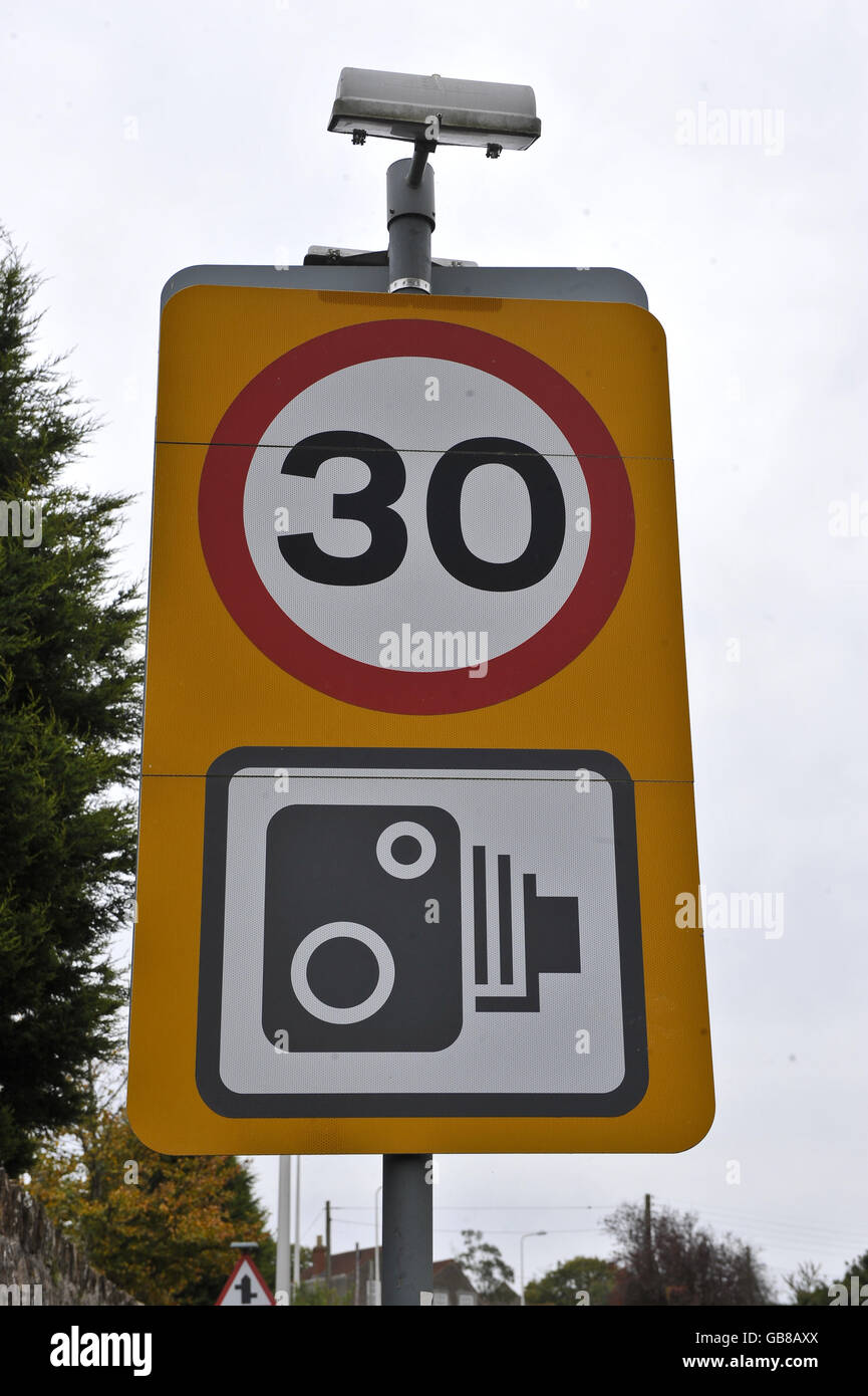 A 30mph sign with speed cameras symbol underneath hi-res stock ...