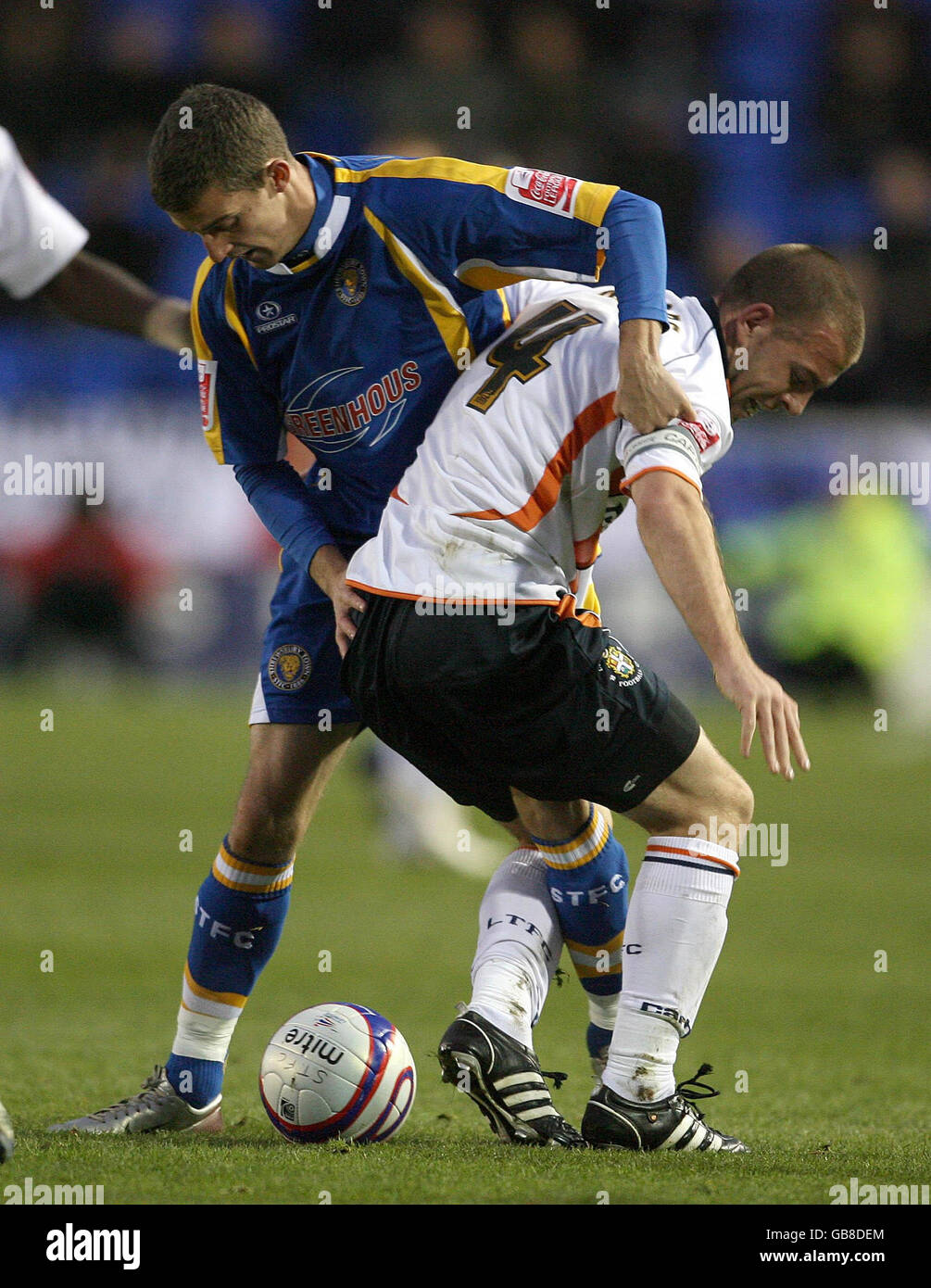 Luton Town's Keith Keane and Shrewsbury Town's Kevin McIntyre battle ...