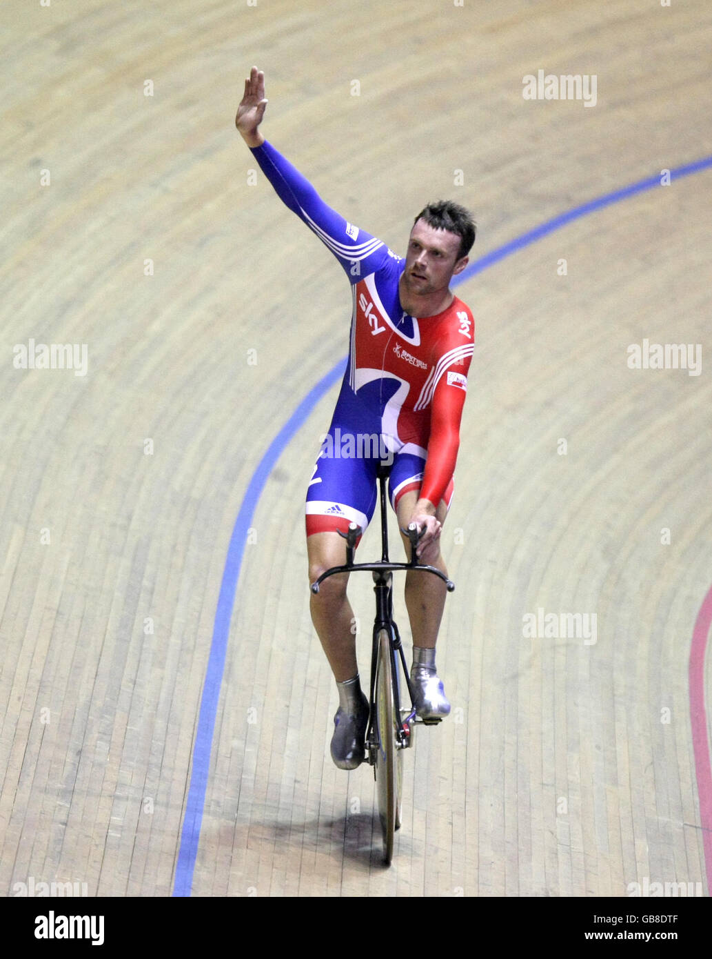 Great Britain's Robert Hayles celebrates after winning the team pursuit ...