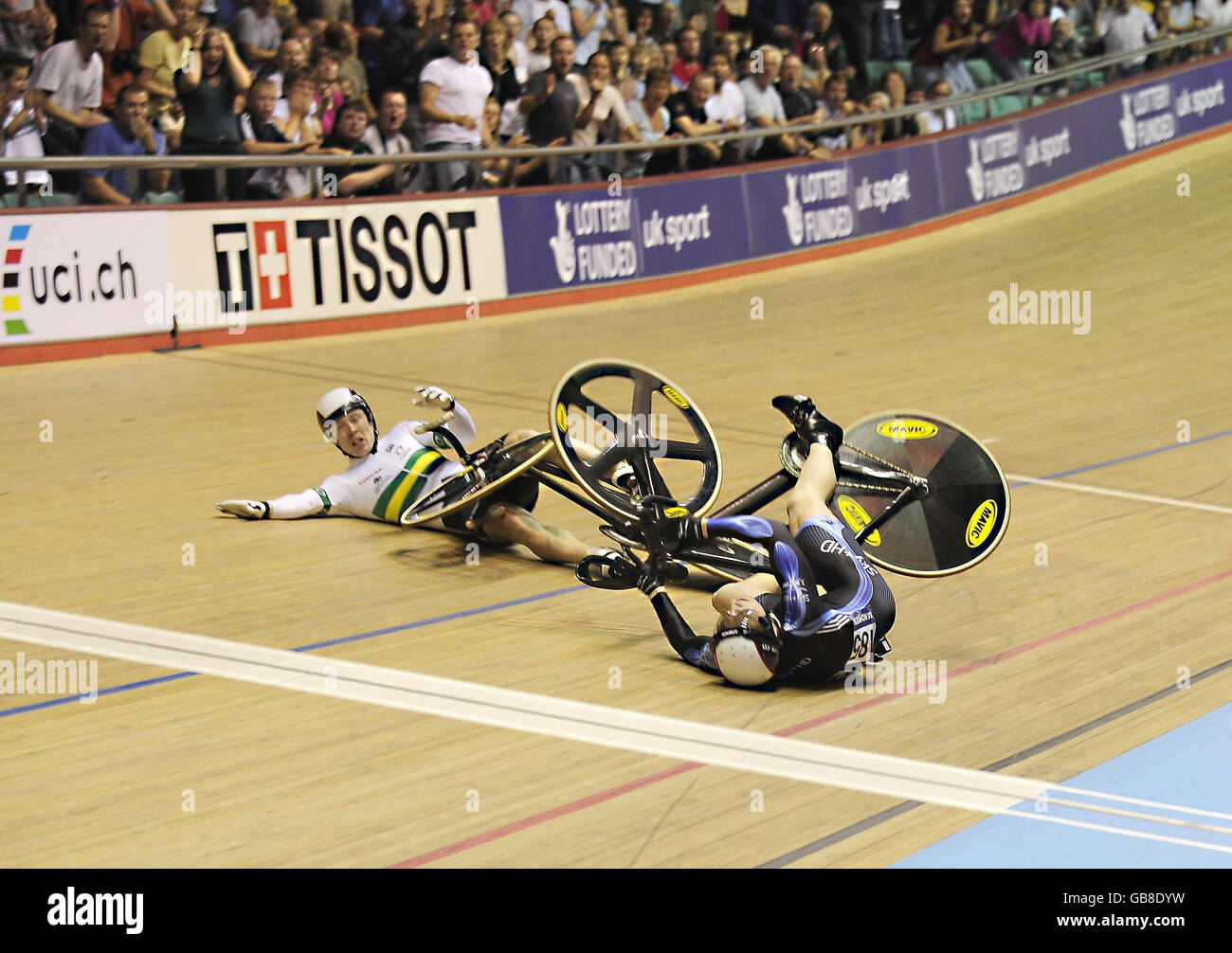 Jason Kenny (right) slides over the finish line to win the Gold Medal ...