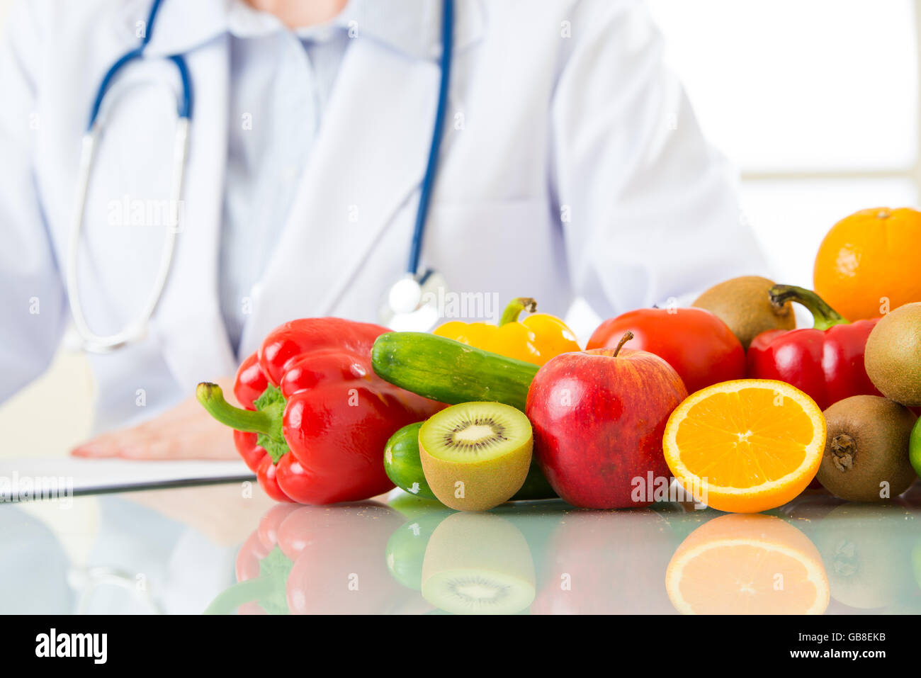 Doctor nutritionist with fruits and vegetable, health eating Stock ...