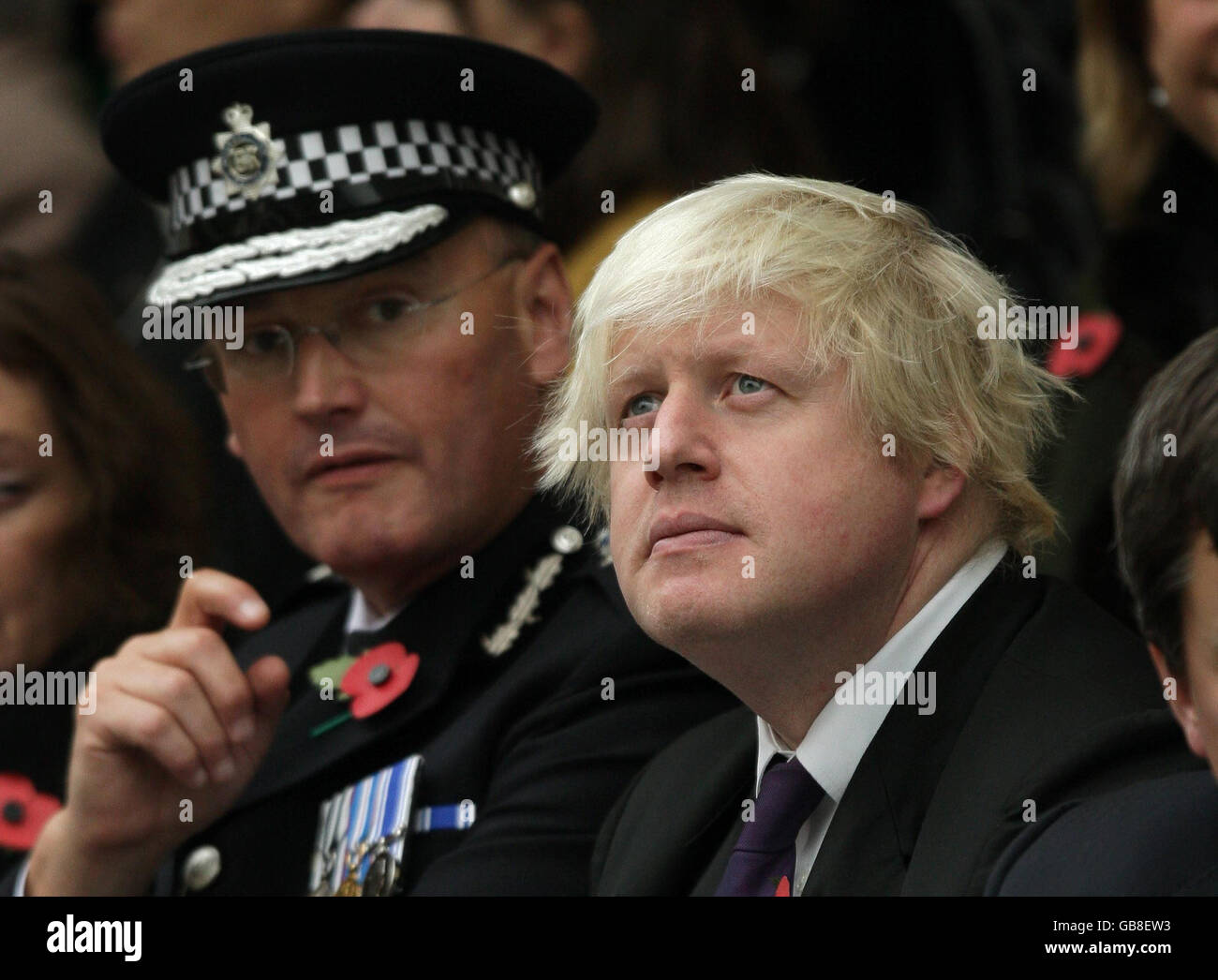 Mayor of London Boris Johnson sits alongside Metropolitan Police Deputy ...