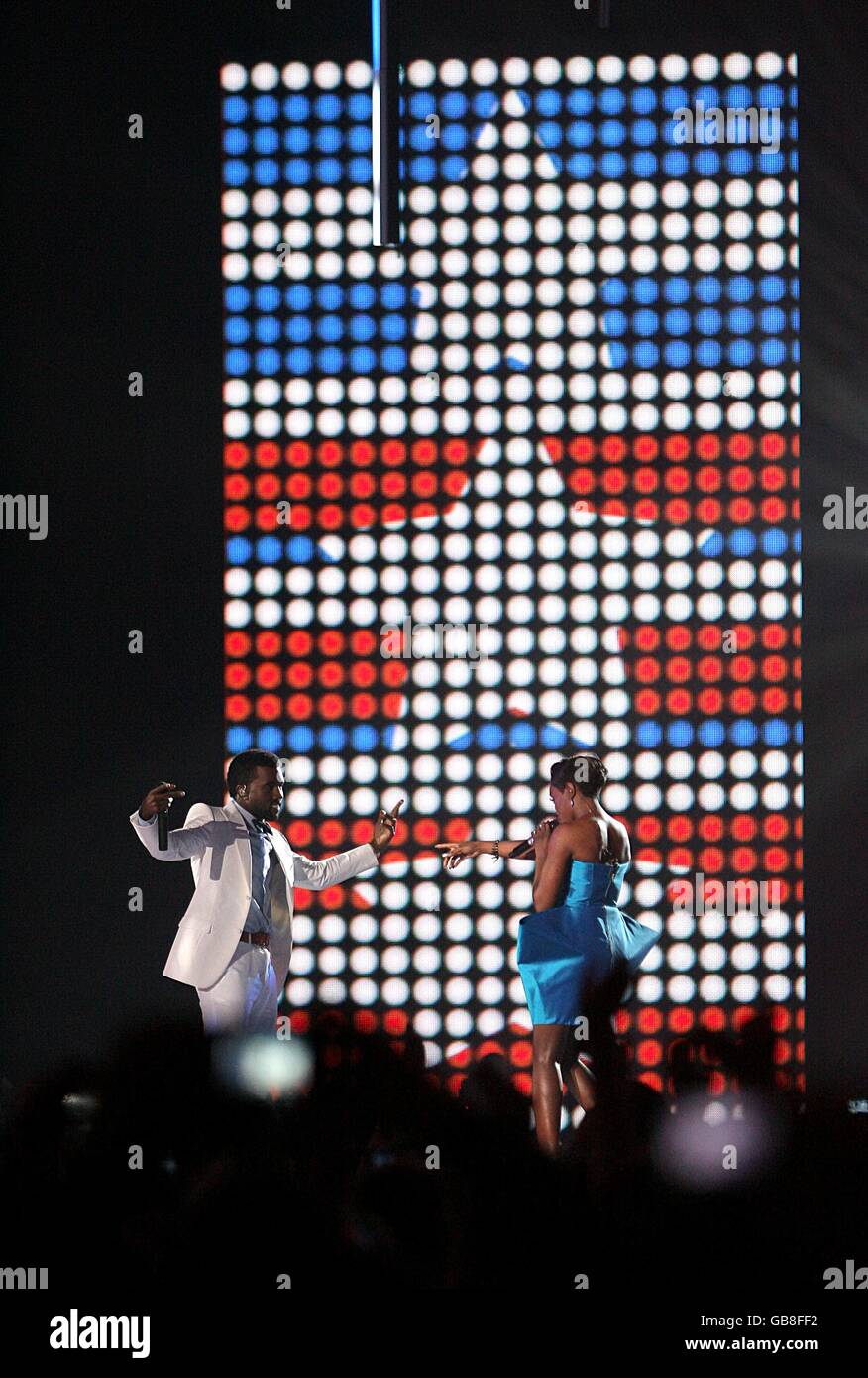 Kanye West and Estelle perform on stage during the 2008 MTV Europe ...