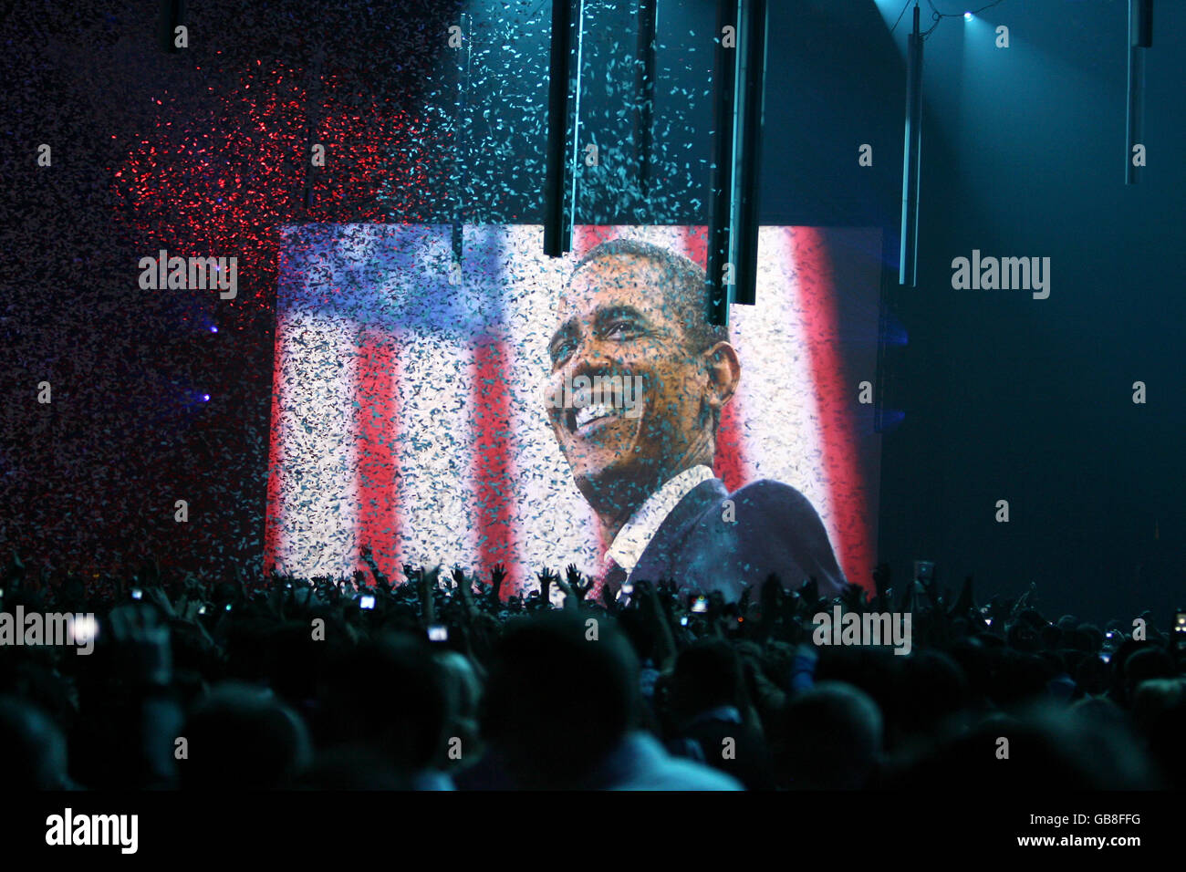 New President of America Barack Obama is shown on a giant screen on ...