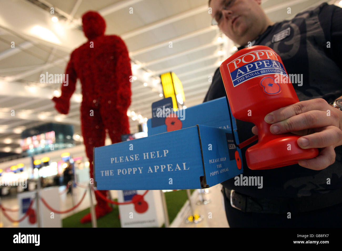 Poppy Man at Heathrow Stock Photo - Alamy