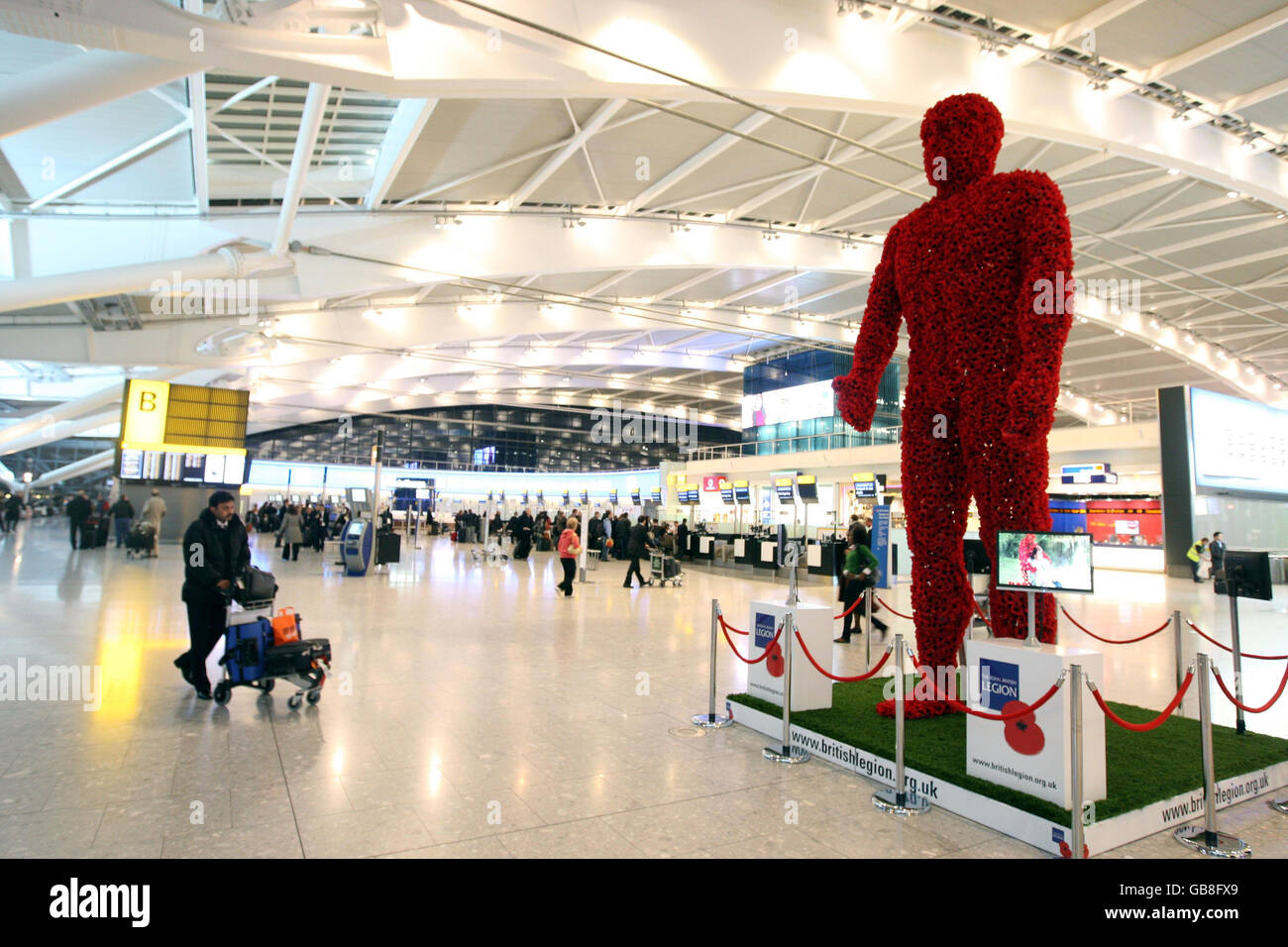 Poppy Man at Heathrow Stock Photo - Alamy