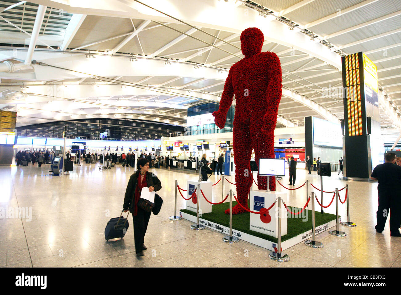 Poppy Man at Heathrow Stock Photo - Alamy