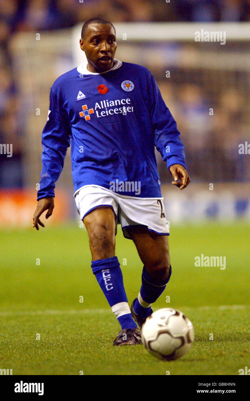 Leicester citys andy impey plays a pass down the channel hi-res stock ...