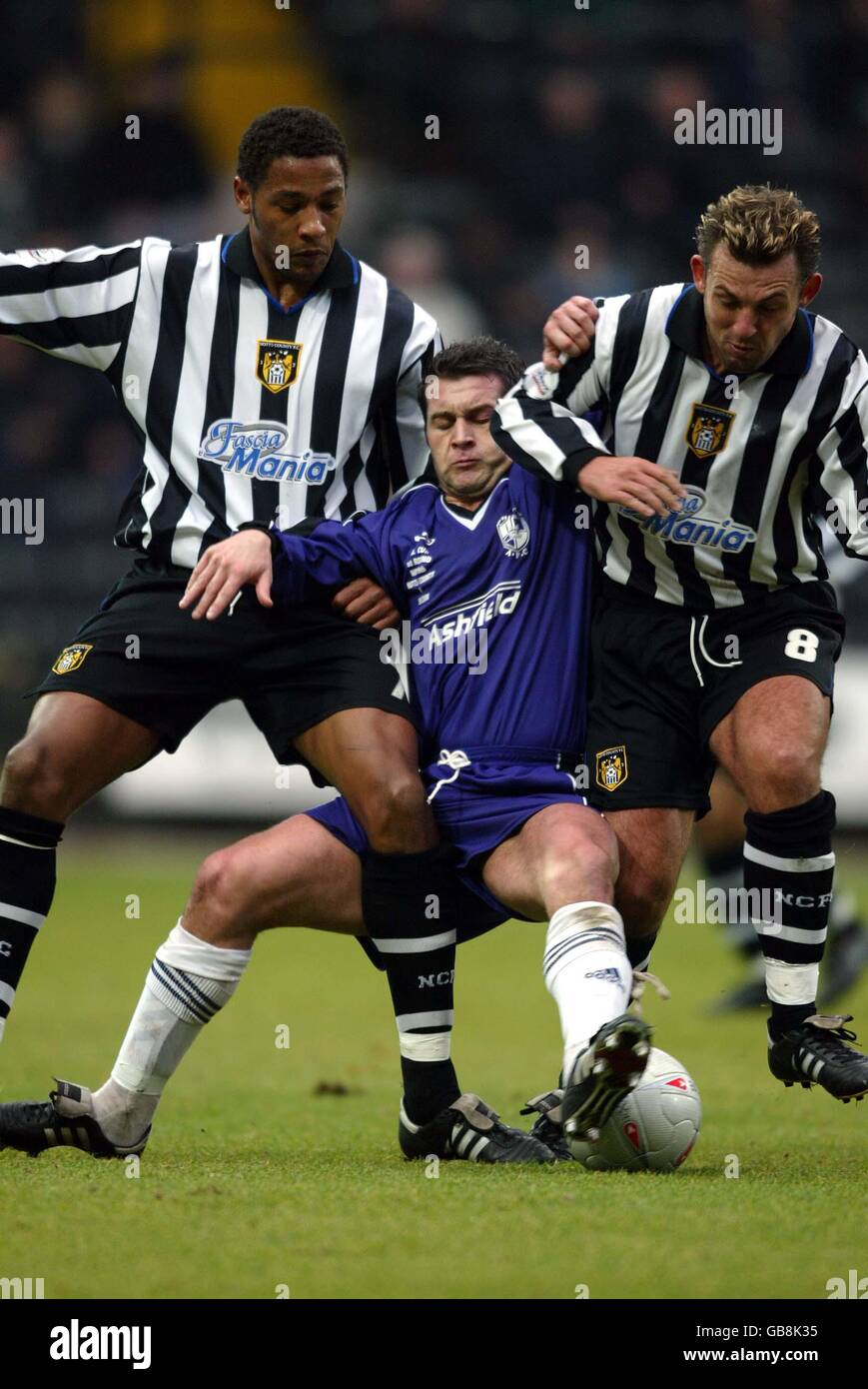 Notts County's Clive Platt (l) and Darren Caskey battle with a Shildon ...
