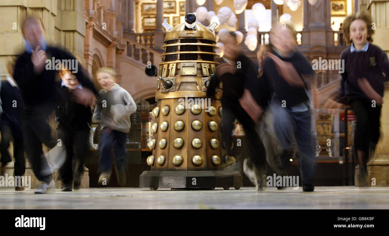 School children run past a Dalek at the Kelvingrove Art Gallery and ...