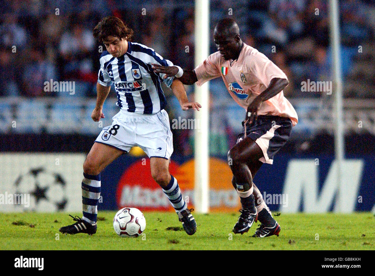 (L-R) Real Sociedad's Bittor Alkiza and Juventus' Stephen Appiah battle ...