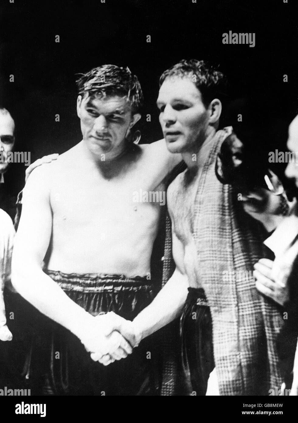 (L-R) Tommy Farr shakes hands with Red Burman after beating him on ...