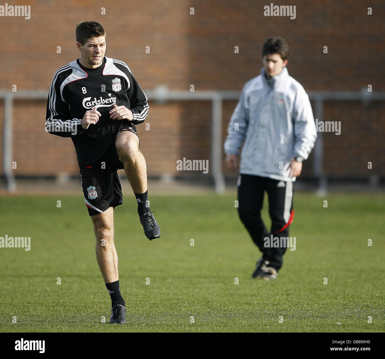 Liverpool's Steven Gerrard with the fitness coach during a training ...