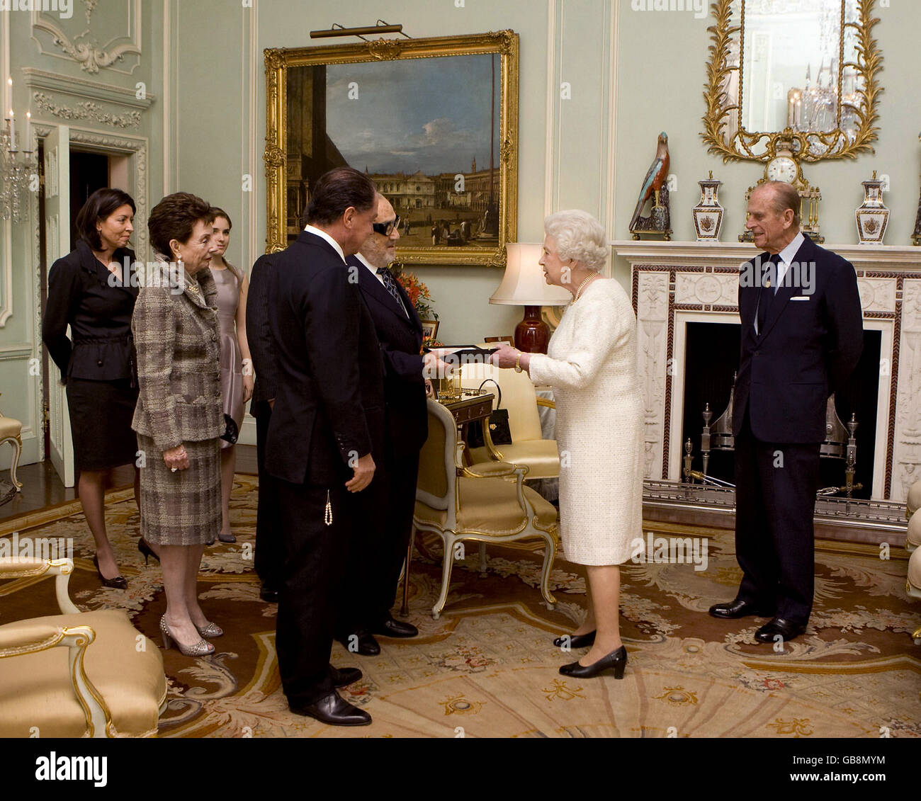 Businessman and philanthropist Samuel Ofer (wearing glasses) is ...