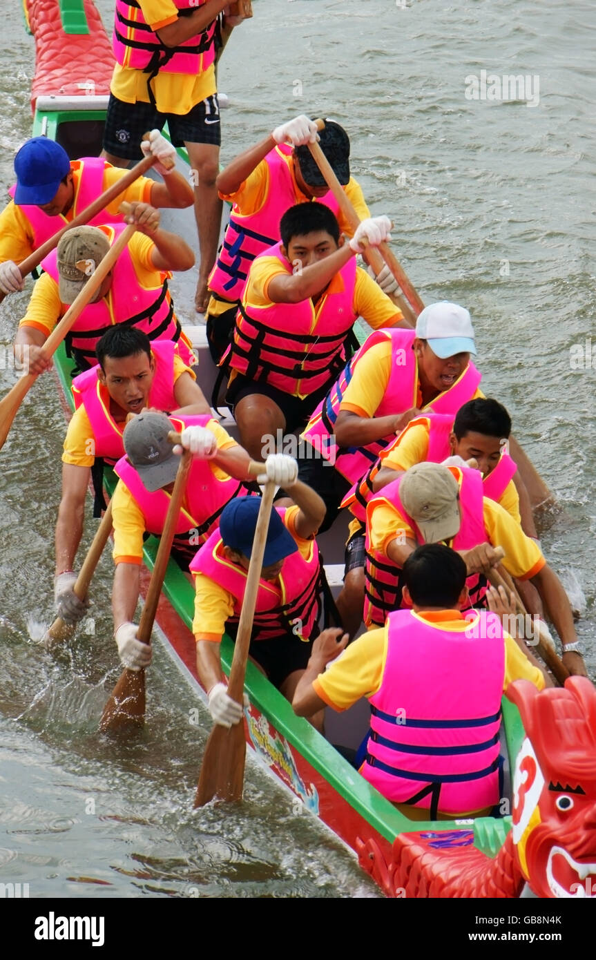 Racer in competition at boat race, they in teamwork building, Sai Gon ...