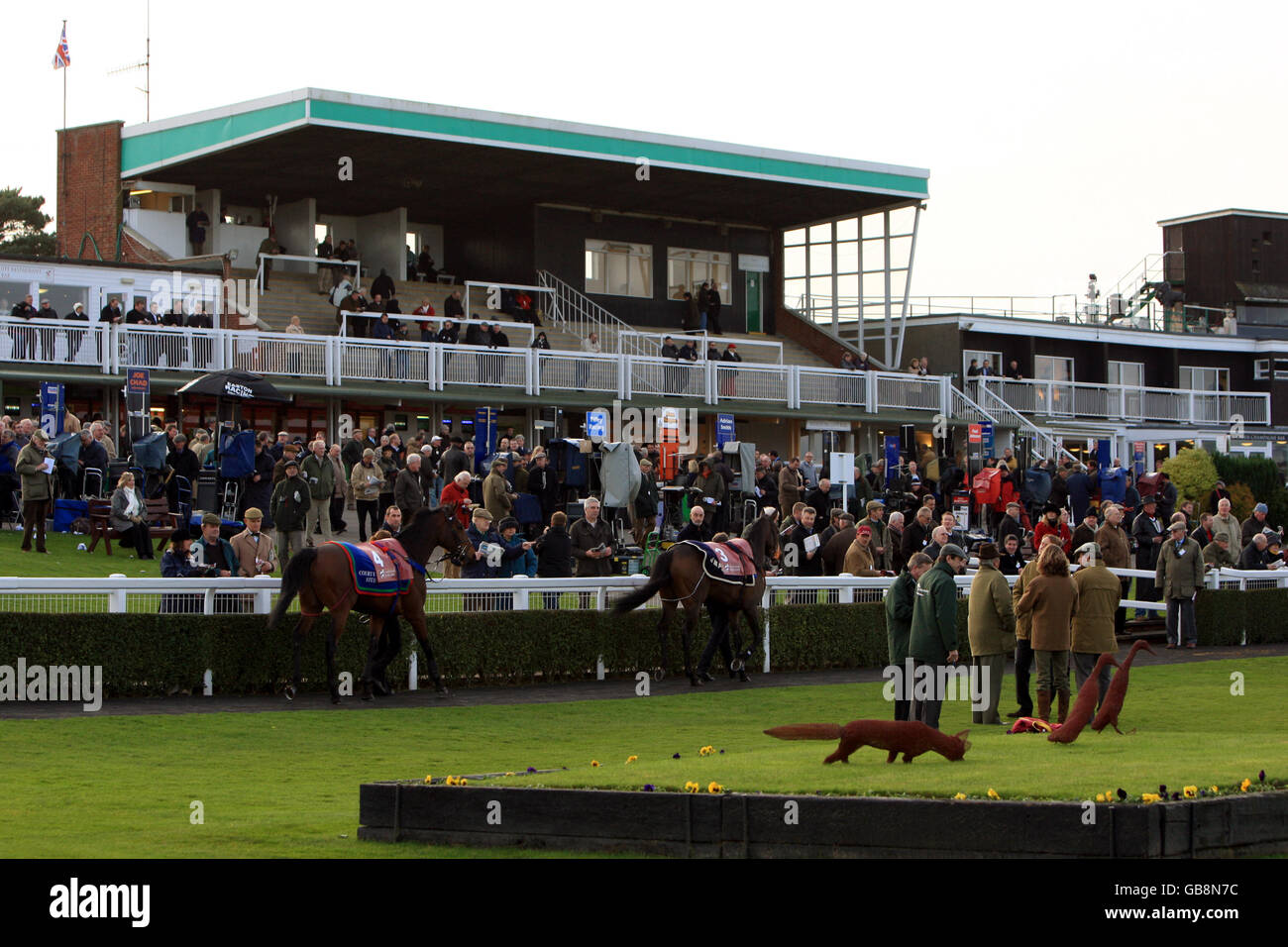 Horse Racing - Race Meeting - Market Rasen Racecourse. Spectators look ...