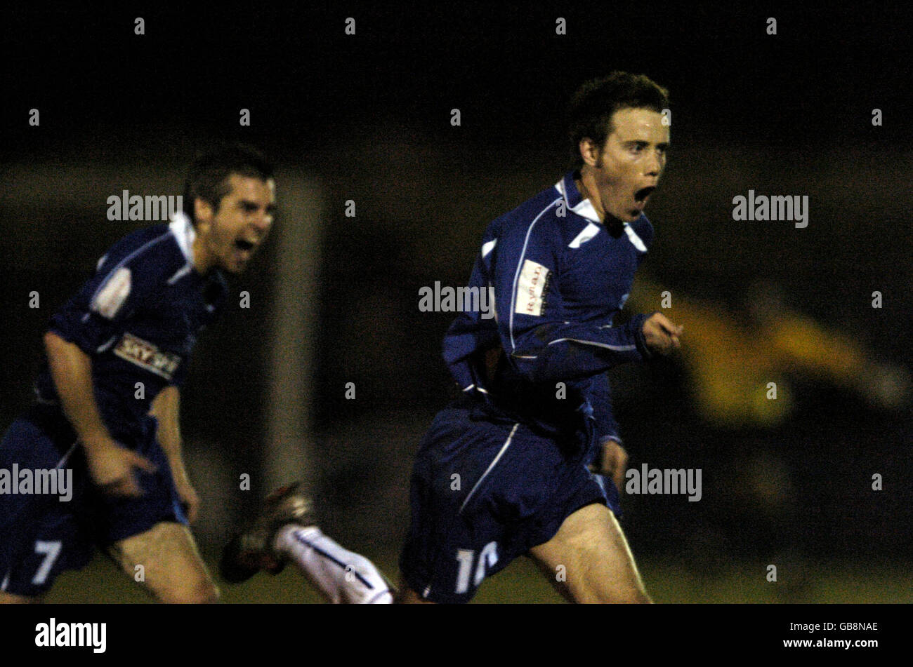 Ford United's Glenn Poole (r) celebrates scoring their equalising goal ...