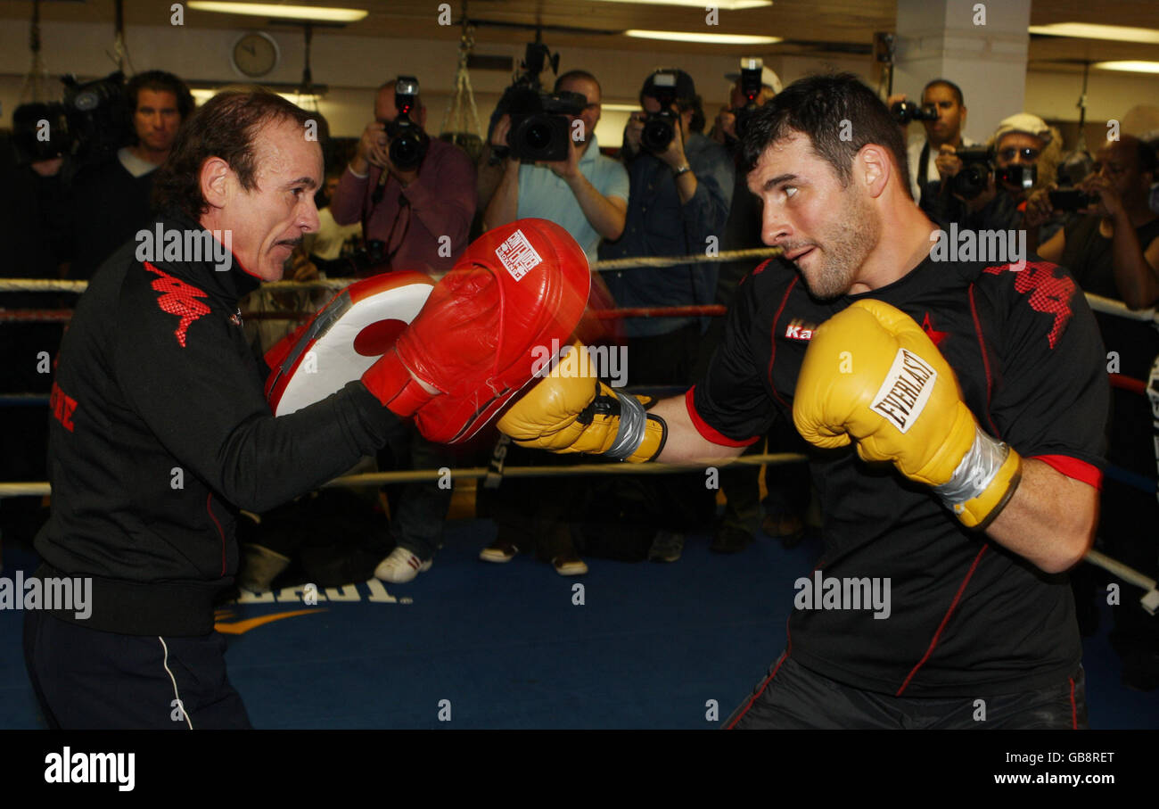 Joe Calzaghe trains with his father Enzo (left) during a training ...