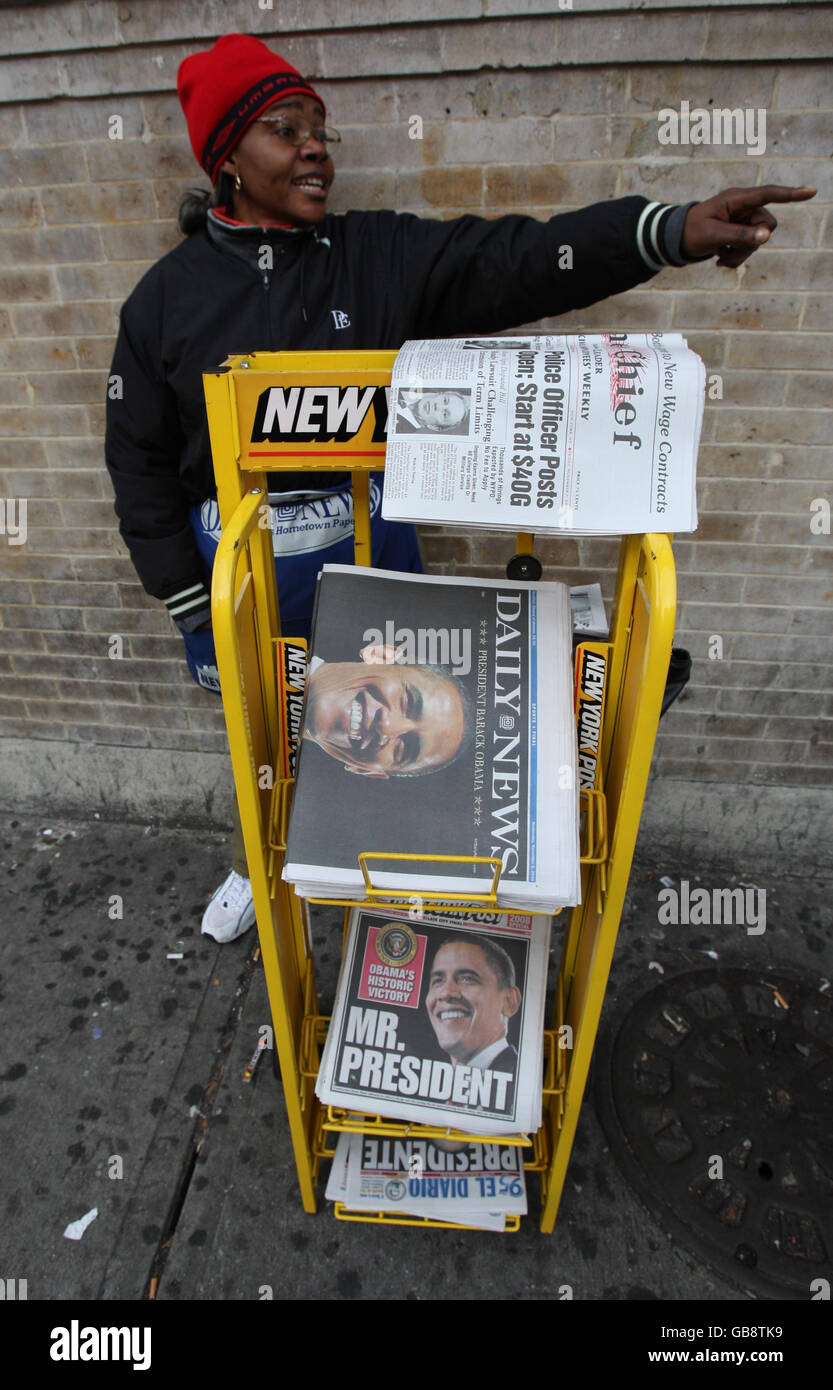 An American woman in Harlem, New York, sells newspapers on the morning ...