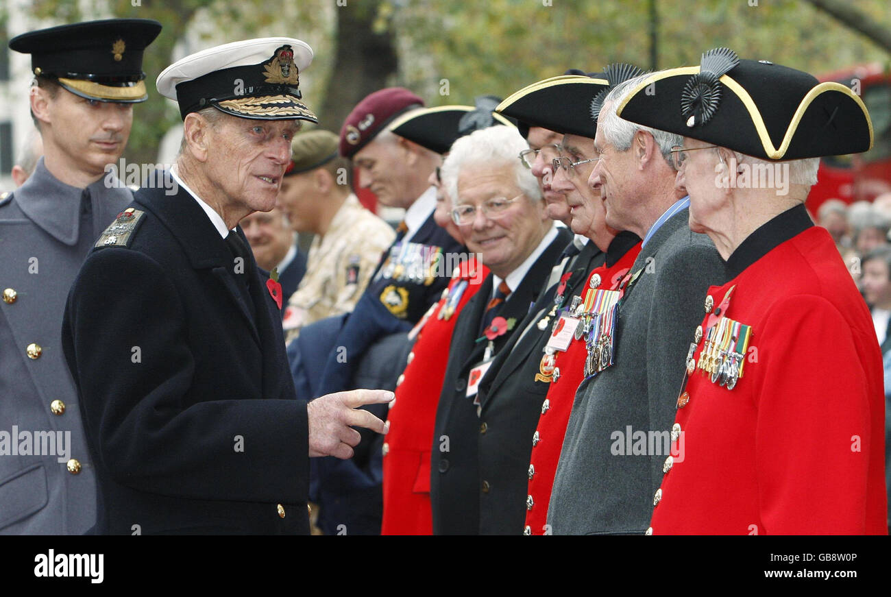 The Duke of Edinburgh (second left) talks to Chelsea Pensioners and war ...