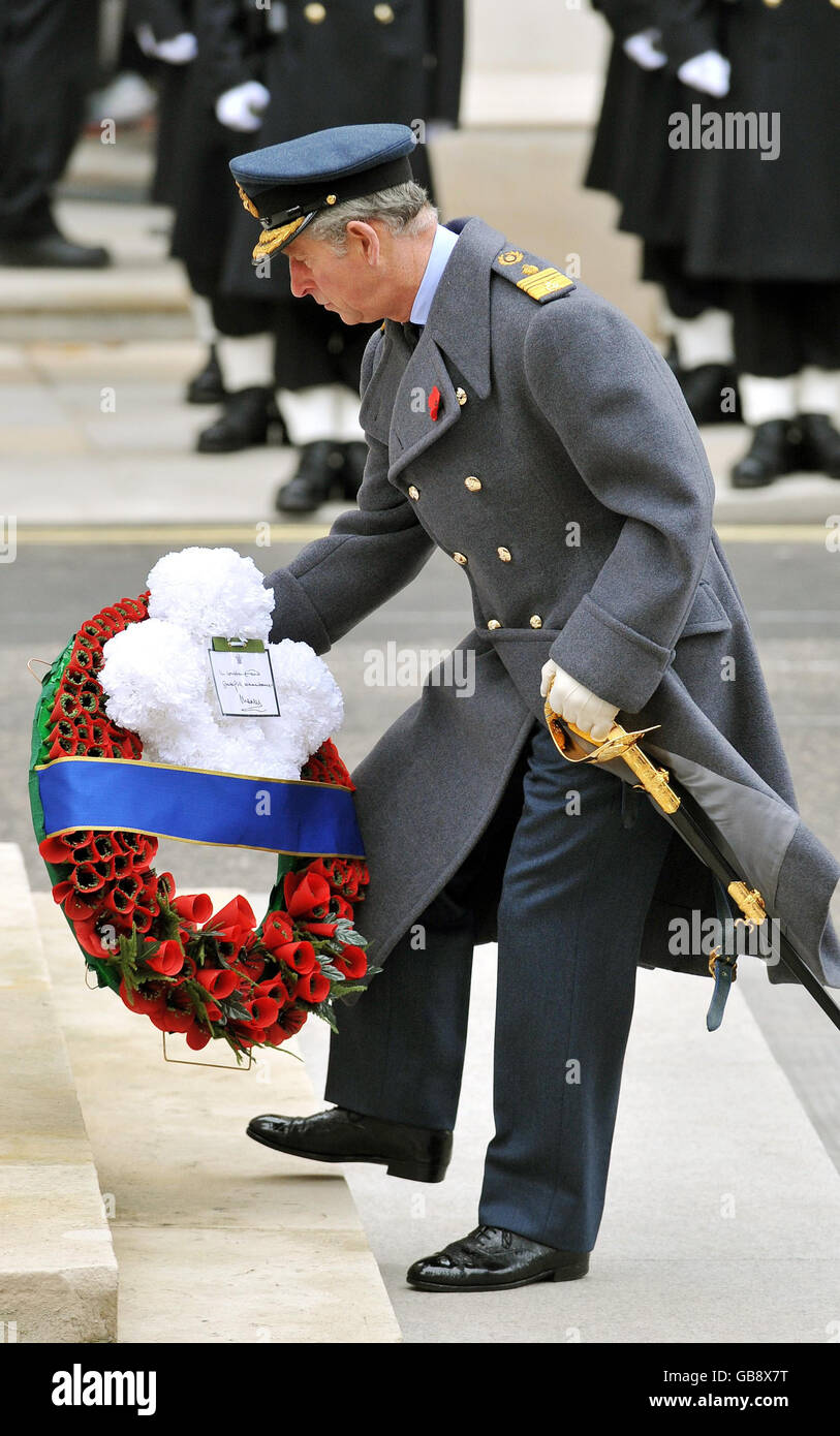 The Prince of Wales lays a wreath during a Remembrance day service and ...