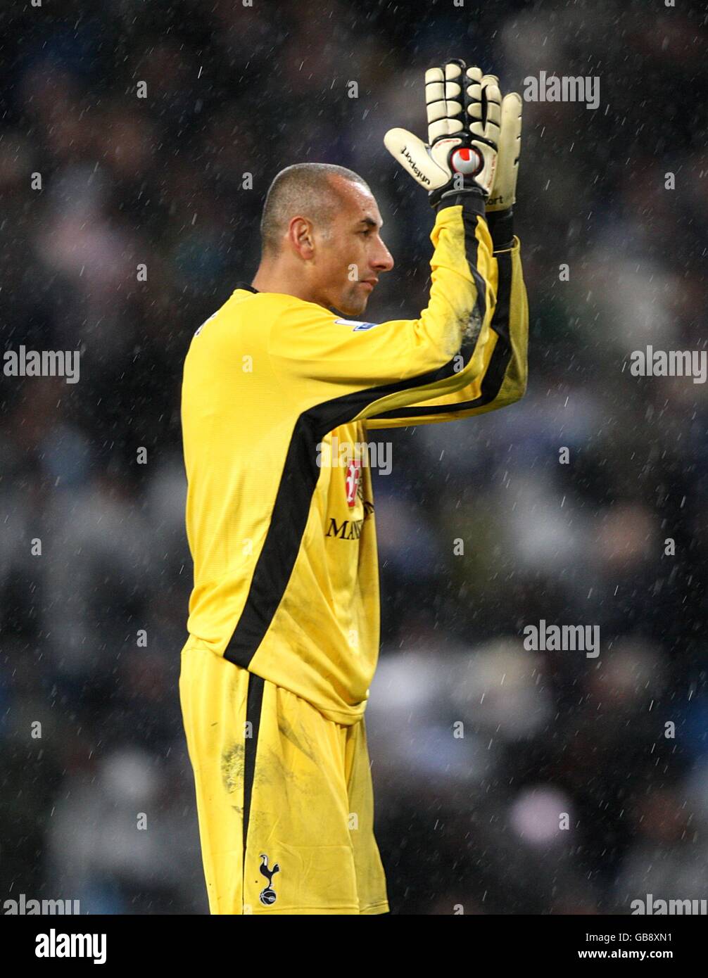Tottenham hotspur goalkeeper applauds the fans hi-res stock photography ...