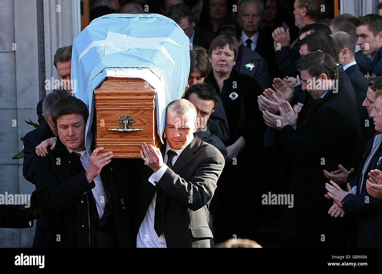 Anthony (front right) carrying the coffin at the funeral, in Limerick ...