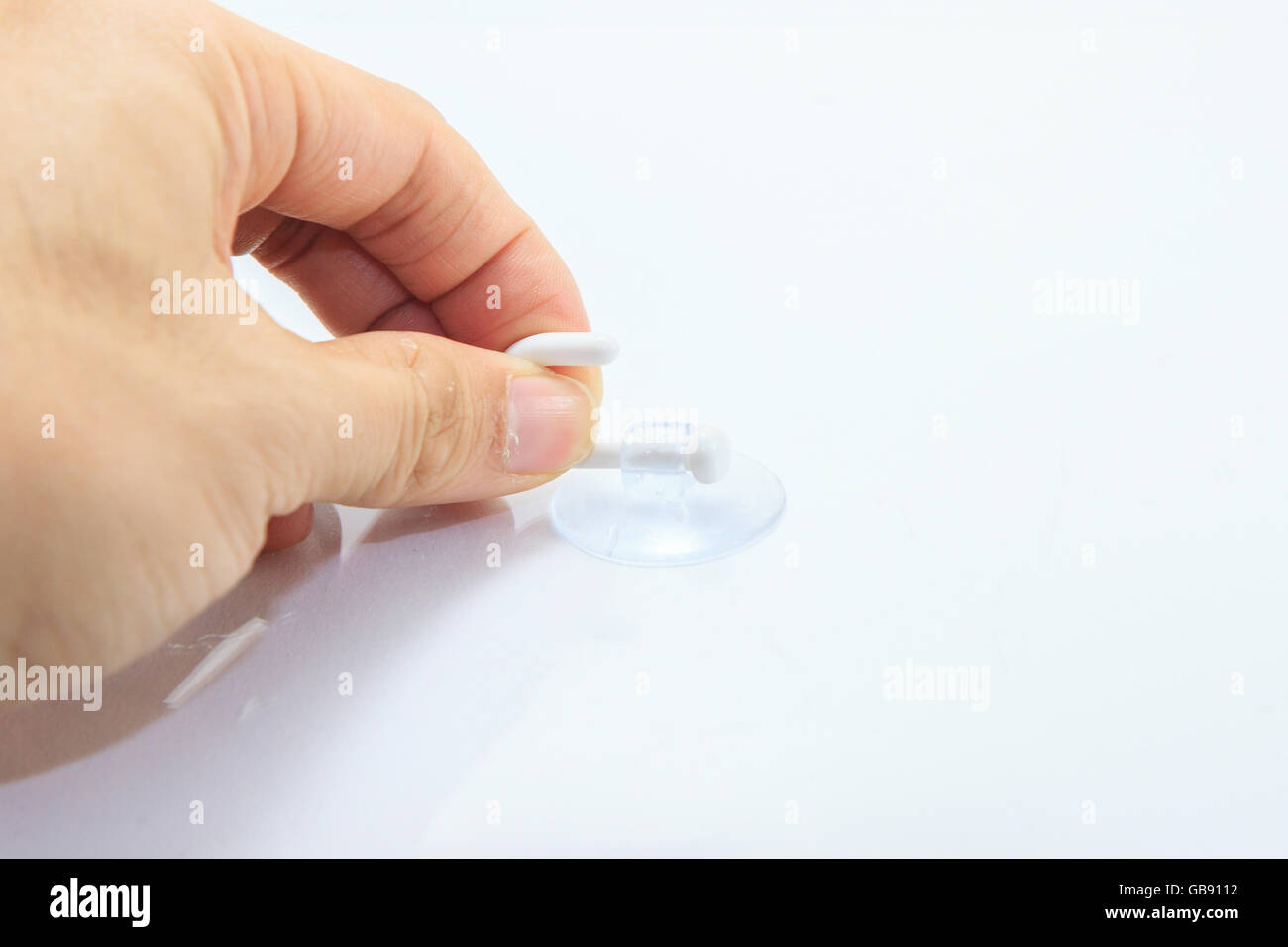 Pull the suction cap from the glass Stock Photo - Alamy