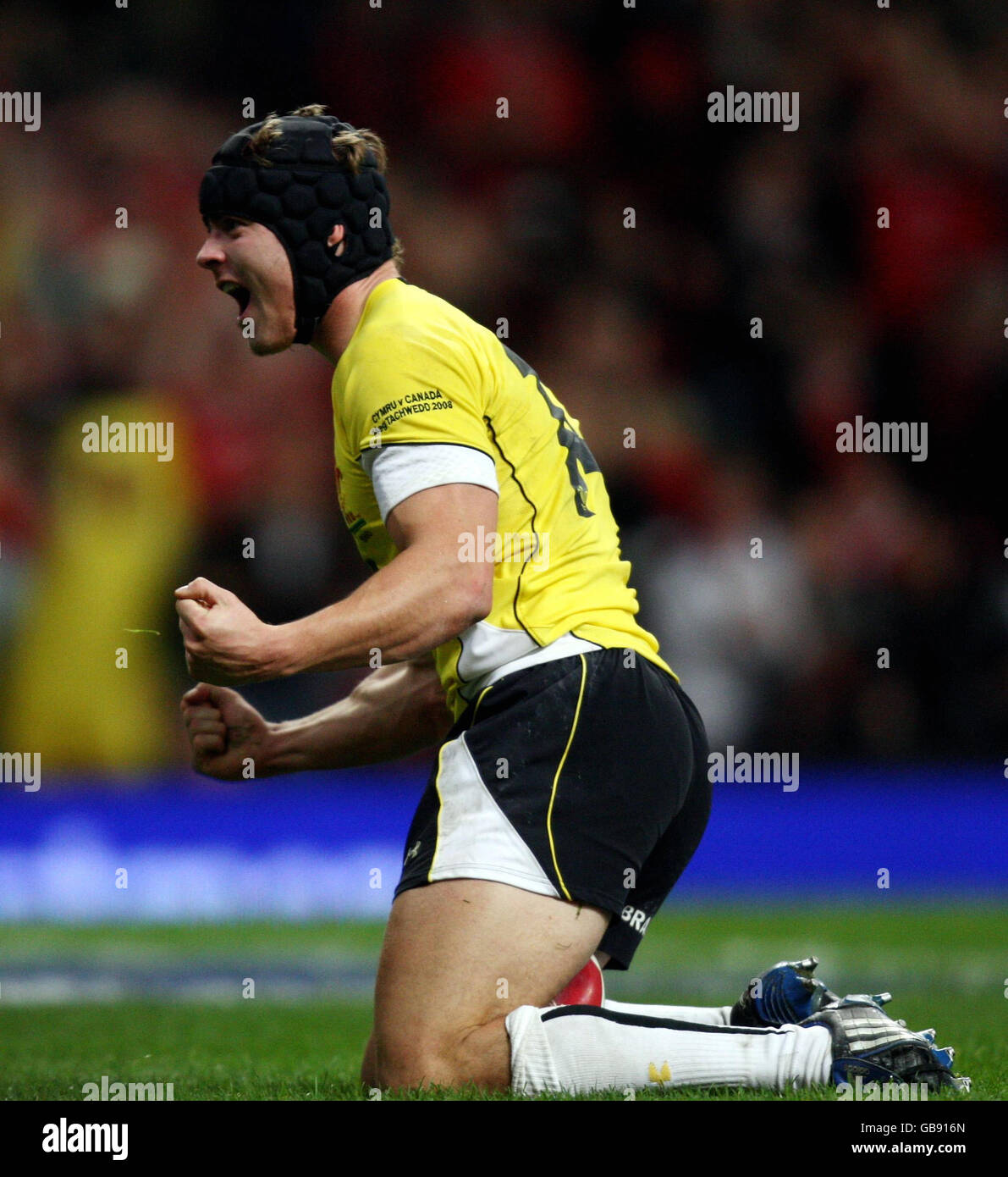 Wales' Leigh Halfpenny celebrates scoring their final try during the ...